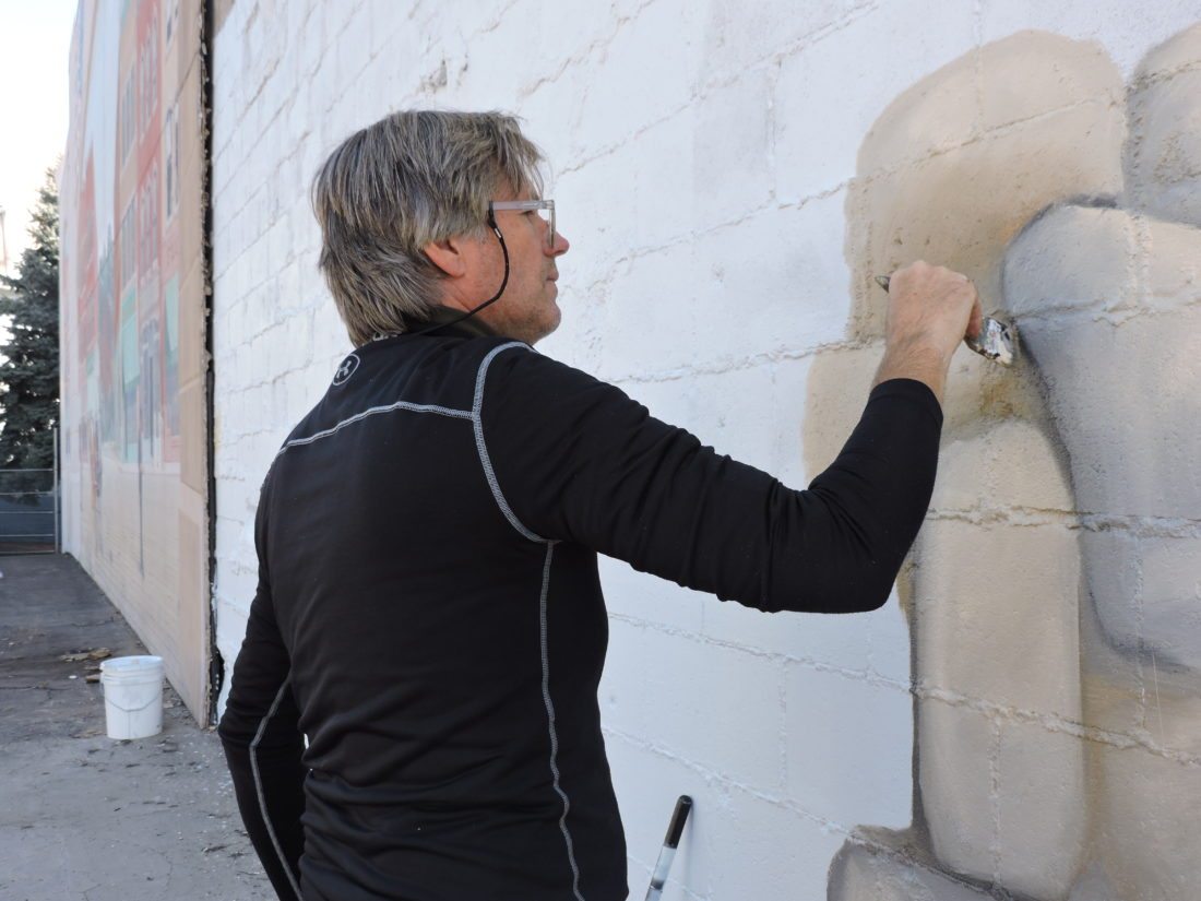 Repairing a downtown mural | News, Sports, Jobs - The Herald Star
